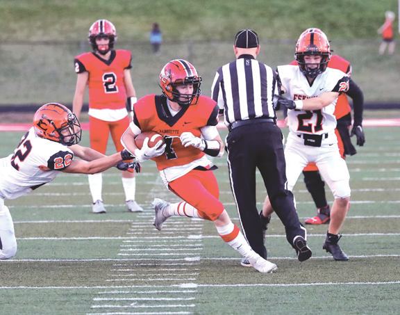 Holding it together: Inexperienced Marquette Redmen football team holds ...